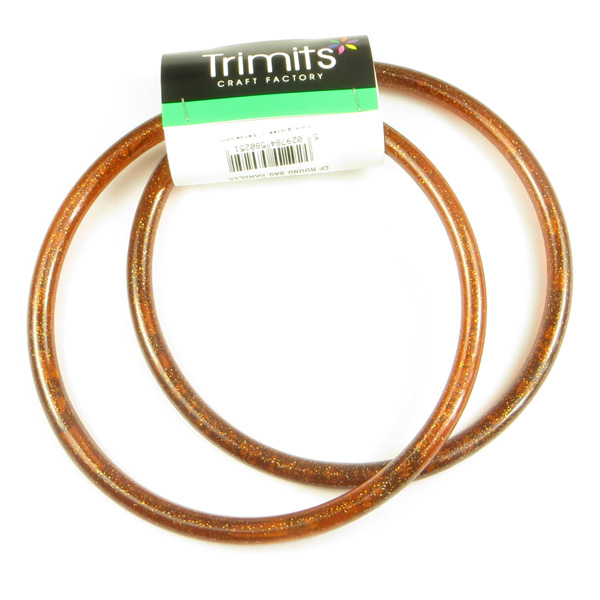 Gold O shaped plastic bag handles